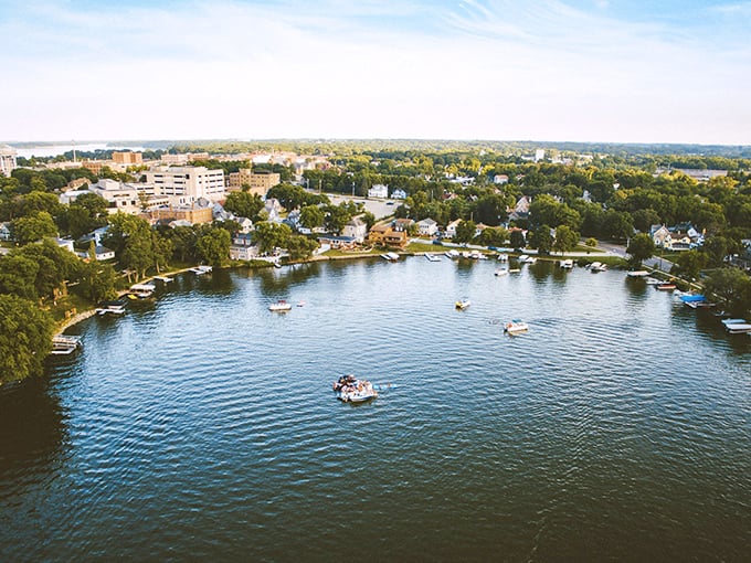 Albert Lea's lakeside charm sparkles under the Minnesota sun. Boats dot the water like confetti at a celebration of small-town living.