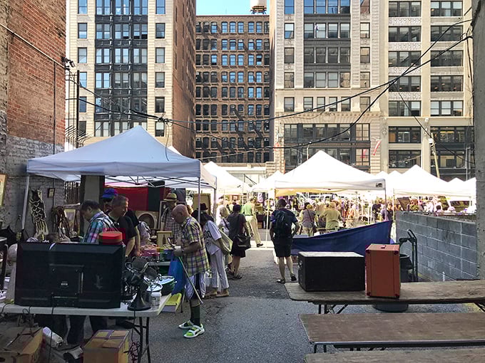 White tents transform a Manhattan parking lot into treasure-hunting heaven where every aisle promises unexpected discoveries.