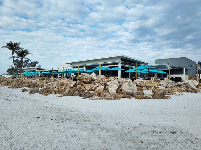 Beach House Waterfront Restaurant sits pretty on the sand like a postcard come to life.