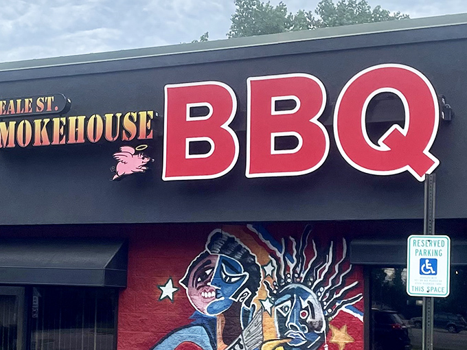 The bold red BBQ sign at Beale Street Smokehouse practically screams "Get in here!" – a siren call for smoked meat lovers everywhere.