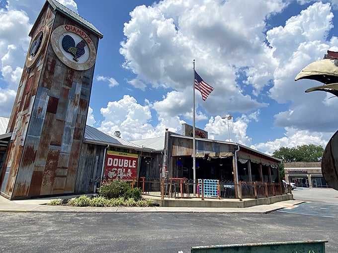 Champy's iconic clock tower stands tall like a rusty sentinel guarding the promised land of crispy chicken delights.