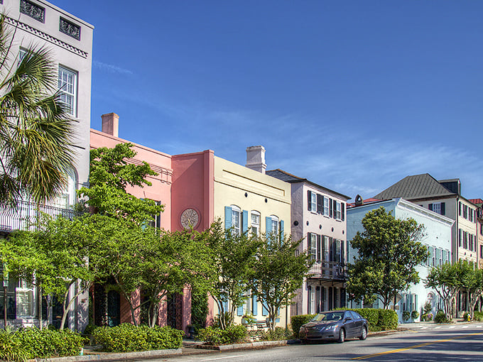 Rainbow Row dazzles with its candy-colored charm! Charleston's iconic pastel houses stand like a box of Southern saltwater taffy under that perfect Carolina blue sky.