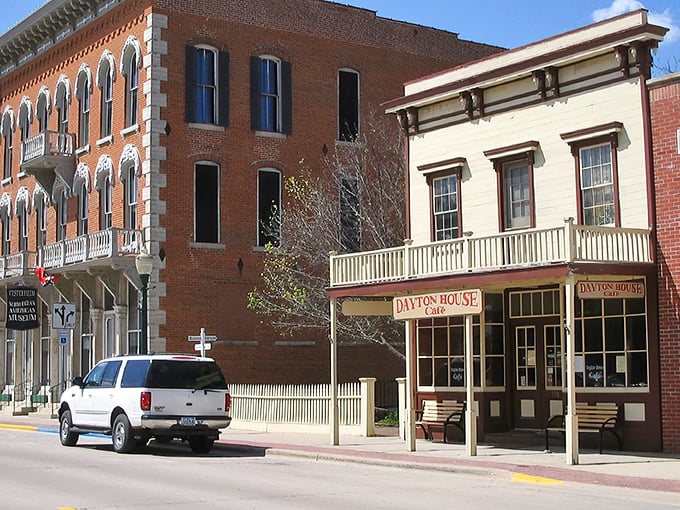 Historic brick buildings line Decorah's charming main street, where the Dayton House Cafe welcomes visitors with small-town hospitality.