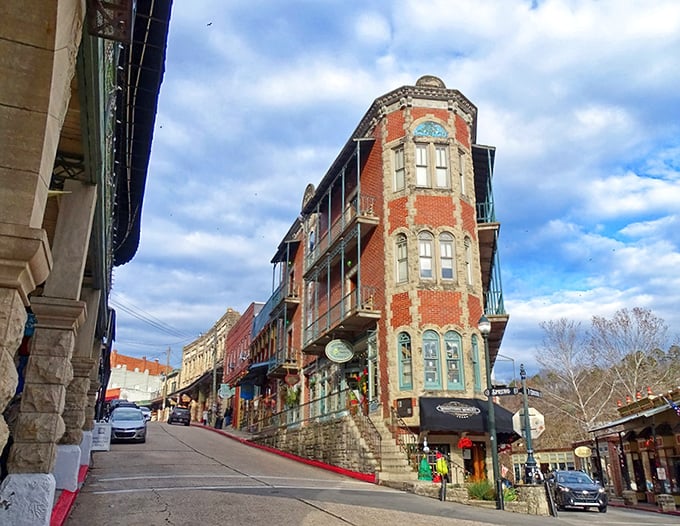 Victorian charm stacked on hillsides like a fancy European postcard – those curved balconies and stone walls absolutely captivate!