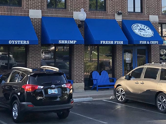 Those bright blue awnings at Fish City Grill aren't just for show – they're like seafood bat signals calling you home.