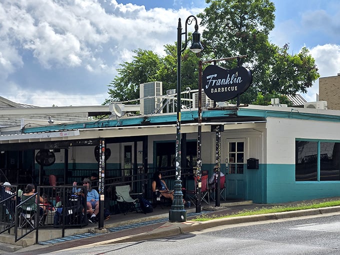 That turquoise building isn't just pretty - it's where BBQ dreams come true in Austin.