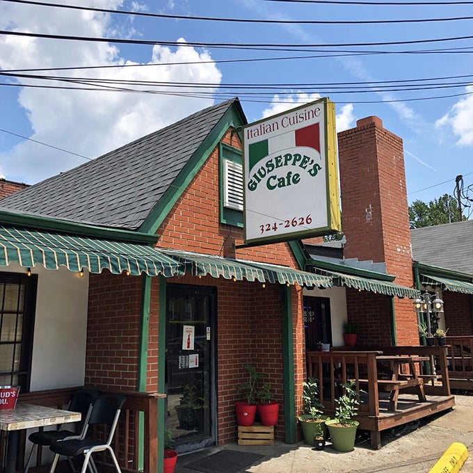 That green awning whispers "authentic Italian" louder than any neon sign ever could.
