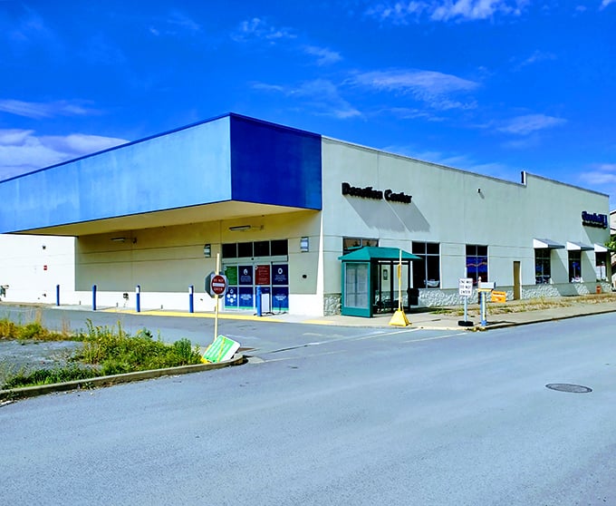 The blue-trimmed exterior of Goodwill Morgantown stands like a department store for second chances. Inside, treasures await!