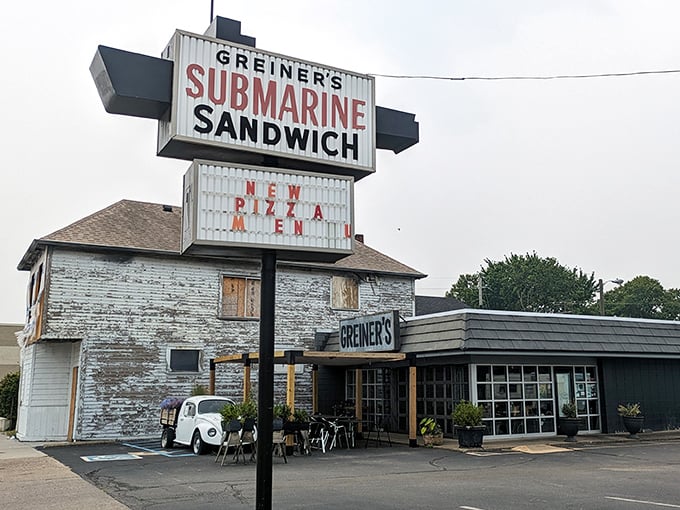 That sign! Like a beacon of sandwich salvation rising above Indianapolis, Greiner's vintage marquee promises submarine delights that have kept locals coming back for generations.