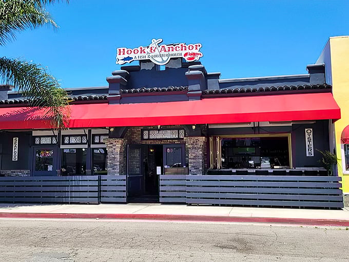 Hook & Anchor's inviting storefront promises seafood treasures within. That red awning is like a beacon for lobster lovers!
