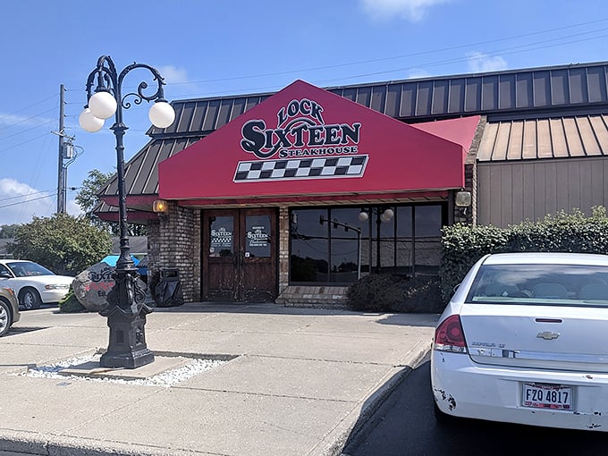 That red and tan exterior promises serious steak magic inside - like a beacon for hungry carnivores.