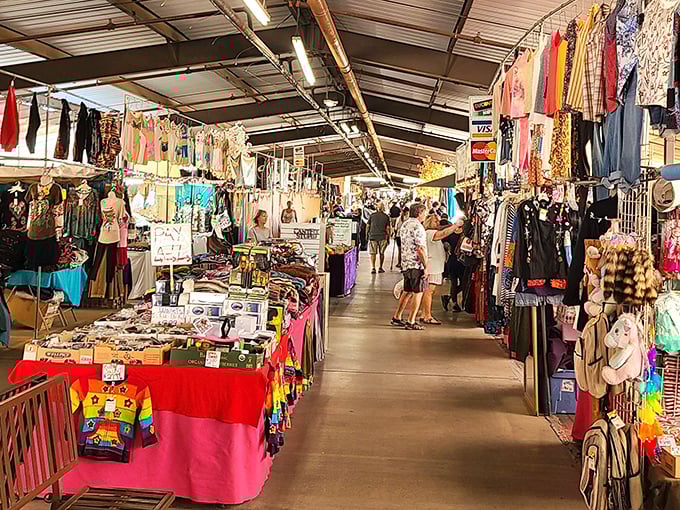 Treasure hunting paradise! The Mesa Market Place's wide aisles beckon with colorful displays of clothing, crafts, and curiosities waiting to be discovered.