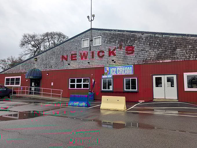 Newick's weathered shingle roof and bold red siding – like that reliable friend who doesn't need fancy clothes to prove their worth.