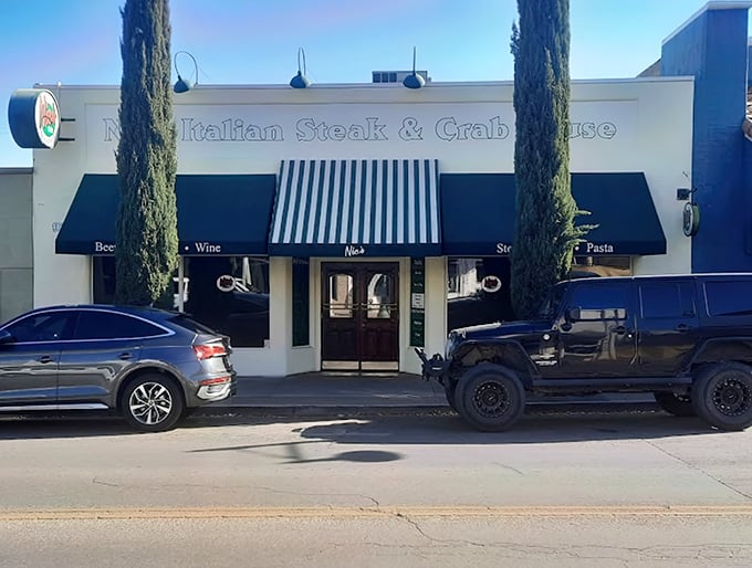 Nic's Italian Steak & Crab House: Classic elegance with tall cypress trees flanking the entrance—like finding a slice of Tuscany in the Arizona desert.