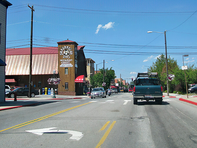 Downtown Sandpoint welcomes visitors with its charming storefronts and mountain backdrop – small-town Idaho at its finest.