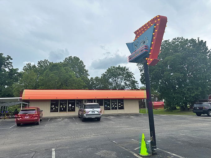That orange roof and twinkling sign aren't just for show – they're beacons calling you to burger paradise!