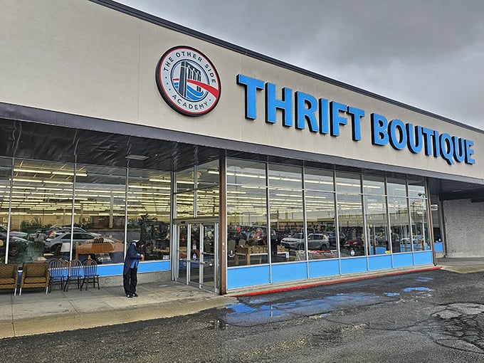 That blue storefront practically shouts "treasure hunt ahead!" - and those massive windows promise serious browsing adventures.