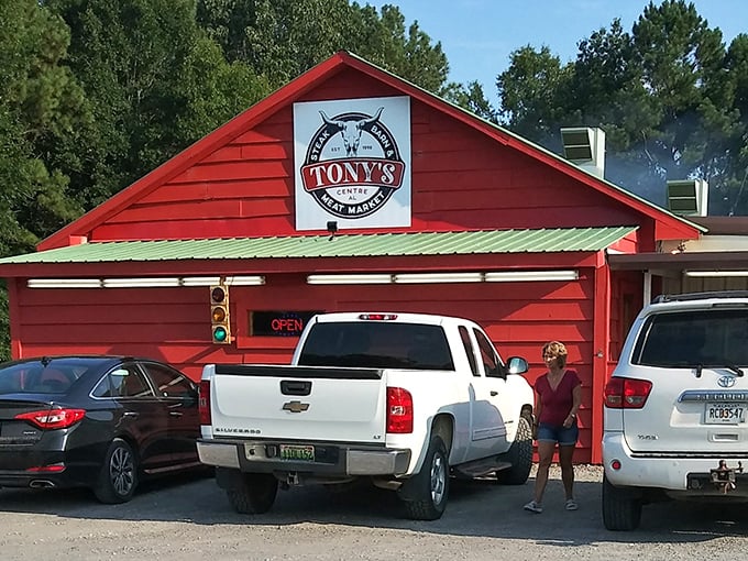That red barn exterior isn't just for show - it's a beacon calling all serious steak lovers home.