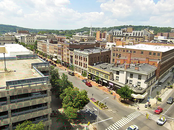 Waterbury's downtown spreads across the valley like a patchwork quilt of brick buildings and tree-lined streets below.