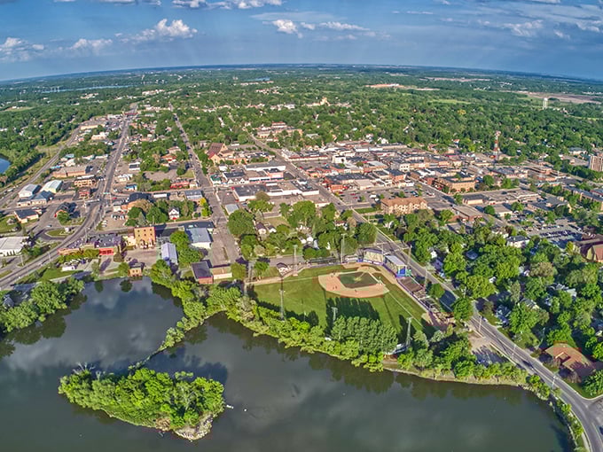 From above, Alexandria spreads like a perfectly planned neighborhood where lakes and community blend into pure Minnesota magic.