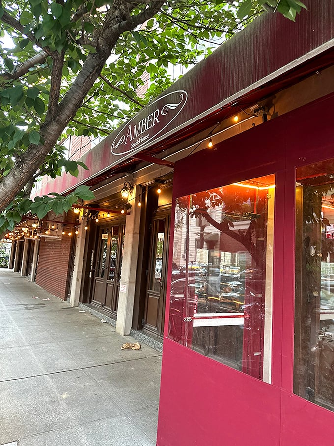 When the neighborhood knows, they know—this unassuming red facade hides some seriously impressive beef behind those doors.
