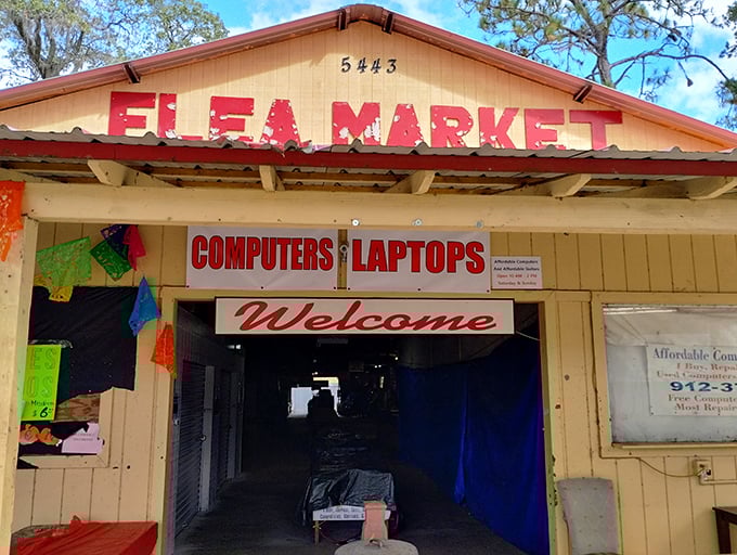 The weathered "FLEA MARKET" sign promises adventures in bargain hunting for those willing to explore.