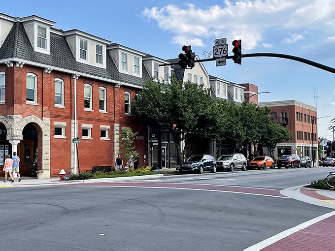 Main Street Brevard moves at the perfect pace - slow enough to notice architectural details, fast enough to reach the coffee shop.