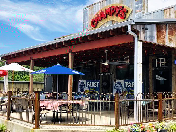 That red "Champy's" sign might as well say "Abandon diets, all ye who enter here" – fried chicken paradise awaits!