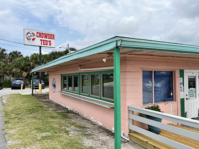The pink and green color scheme might scream "1950s Florida motel," but Chowder Ted's sign promises what locals already know—this is chowder paradise, no fancy frills required.