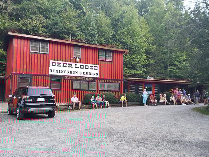 The crowd lined up outside says it all — this rustic red lodge is where mountain appetites meet their match.