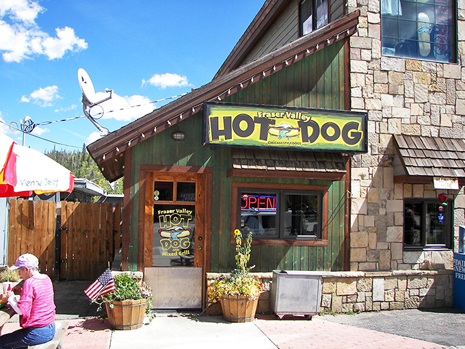 That bright yellow "HOT DOG" sign isn't just advertising – it's a beacon of hope for hungry hikers and skiers in Winter Park.