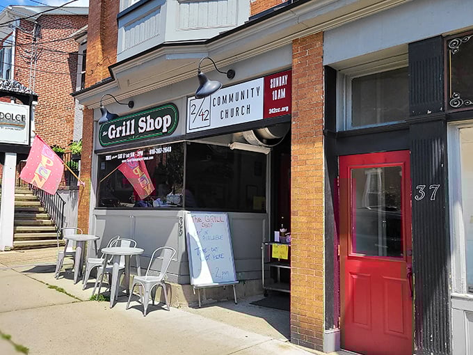 That classic green awning signals serious hot dog business - no frills, just grills.