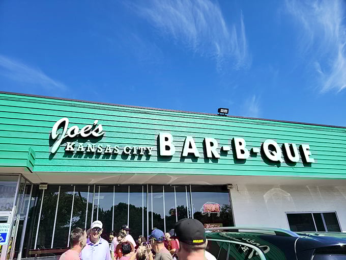 The line forms early at Joe's Kansas City BBQ. When smoke signals this good drift through the air, people answer the call.