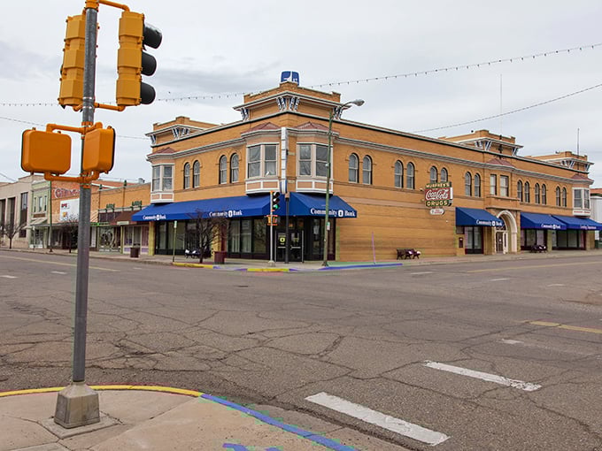 Banking on affordability! This corner landmark houses the Community Bank where locals joke their money grows faster than anywhere else—unlike those big-city ATM fees!