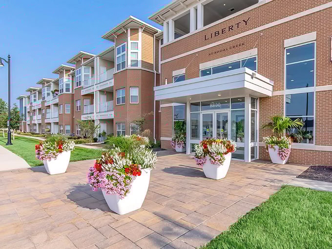 Sunshine highlights Liberty's thoughtful design – those white planters aren't just pretty, they're saying "Welcome home!"