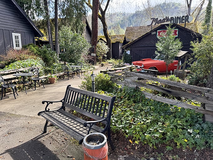 Garden seating at Mac's feels like dining in your cool neighbor's backyard—if your neighbor had a vintage diner and classic car collection.