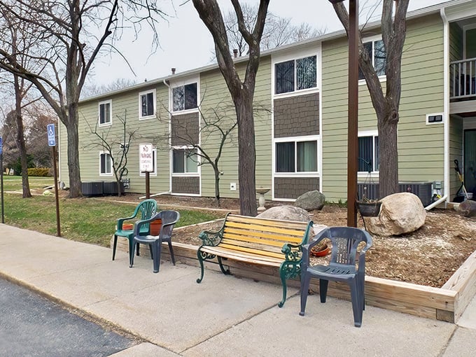 Outdoor seating areas at Mill Pond Manor invite neighborly chats – like Facebook but with actual faces and fresh air!