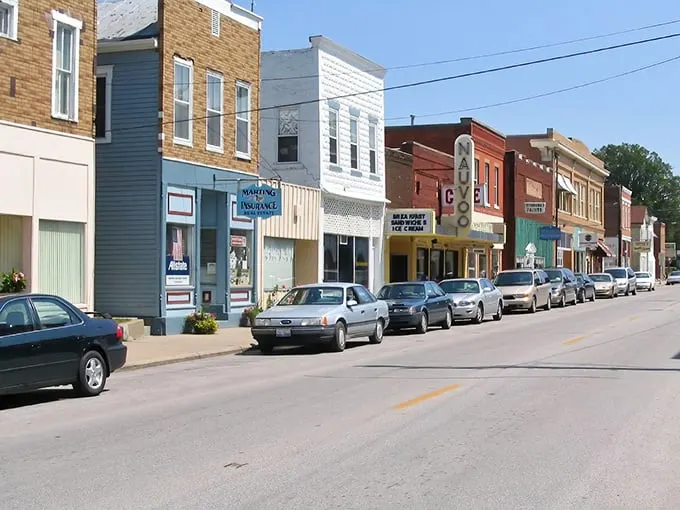 Main Street magic with a cherry on top! Nauvoo's ice cream shop beckons from this colorful row of storefronts where every business has a story sweeter than dessert.