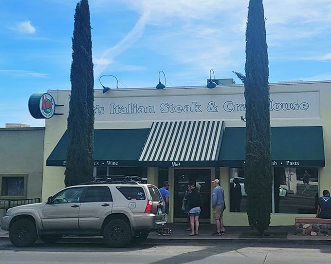 Nic's Italian Steak & Crab House: That striped awning isn't just for show—it's practically waving you in for a steak that would make Tony Soprano weep with joy.