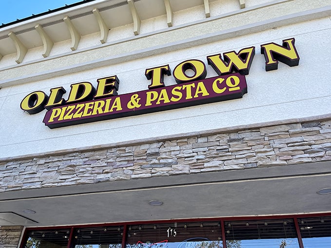 Those bold yellow letters promise big flavor, and boy do they deliver. Like finding a Rolex at a yard sale, this unassuming storefront houses pizza treasures beyond your wildest dreams.