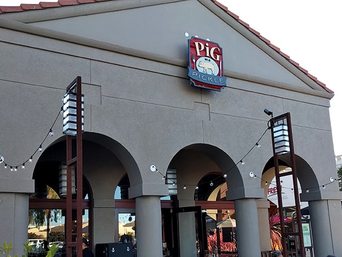 That "Pig in a Pickle" sign isn't just cute wordplay—it's a beacon calling all barbecue pilgrims home.