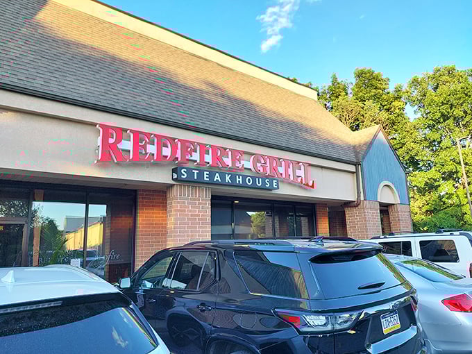 Under the afternoon sun, RedFire Grill’s bold red sign makes a promise few can resist — steaks worth stopping for.