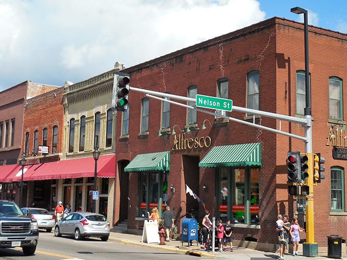 Brick buildings stand like loyal sentinels, each one holding decades of stories and small-town dreams.