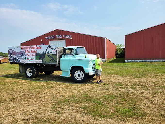 Nothing says "serious flea market business" like a mint-green vintage truck ready for hauling home deals.