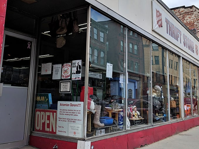 Peek through these windows and glimpse a world of second-hand possibilities. The Salvation Army's display hints at the bargain adventure awaiting.
