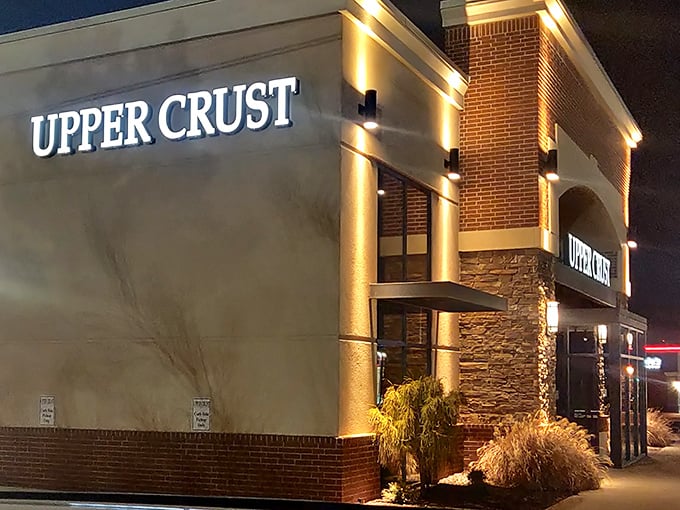 Night or day, Upper Crust's glowing sign beckons pizza lovers like a lighthouse for the hungry. The perfect beacon after a long Oklahoma day.