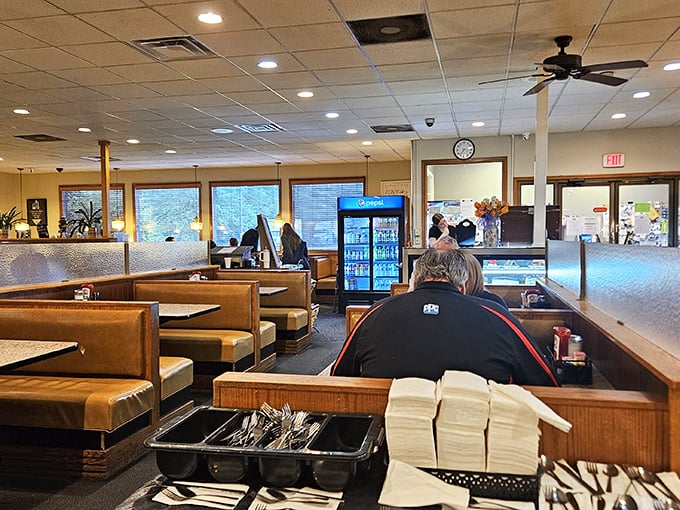 Classic booths and counter seating create that perfect diner geometry—where strangers become neighbors and calories don't count before noon.