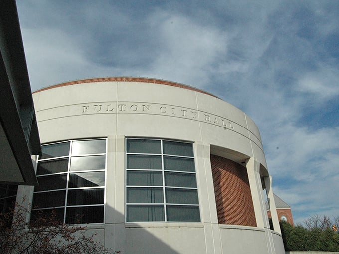 The sleek, modern Fulton City Hall blends contemporary design with small-town functionality. Its curved façade and large windows create an inviting civic space that welcomes residents and visitors alike.