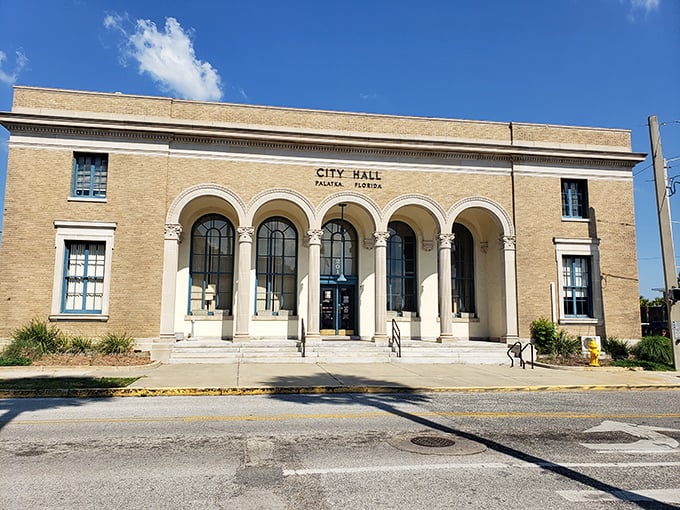 Palatka's City Hall stands proudly with its classical columns, looking like it's ready to host a small-town version of "Parks and Recreation."
