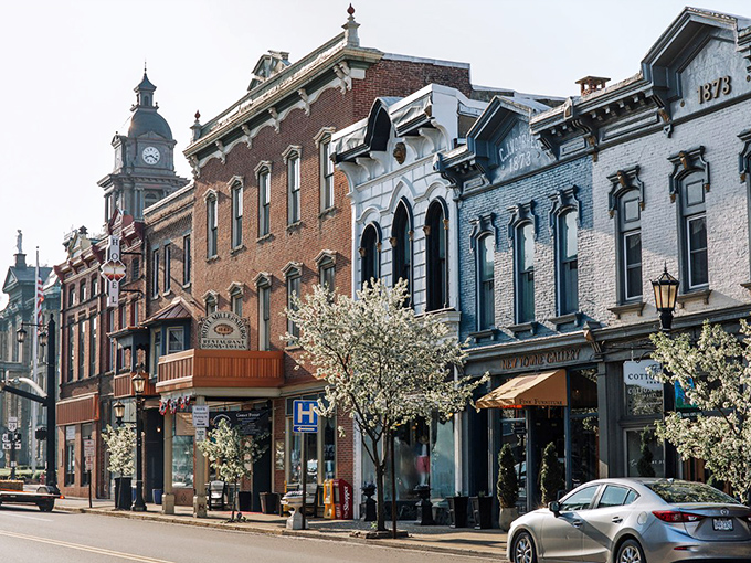 Spring blossoms frame Millersburg's meticulously preserved brick facades, creating a downtown straight out of a Hallmark movie—but with better shopping.